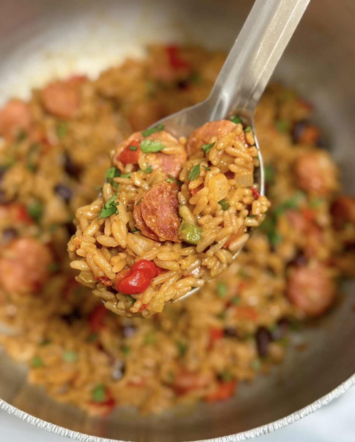 Arroz con Chorizo (Puerto Rican Rice with Smoked Sausage) - Made with Sazón